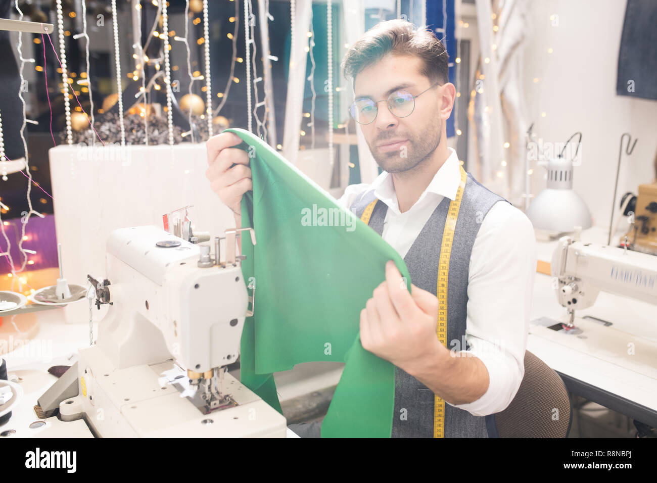 Male Tailor Sewing at Machine Stock Photo - Alamy