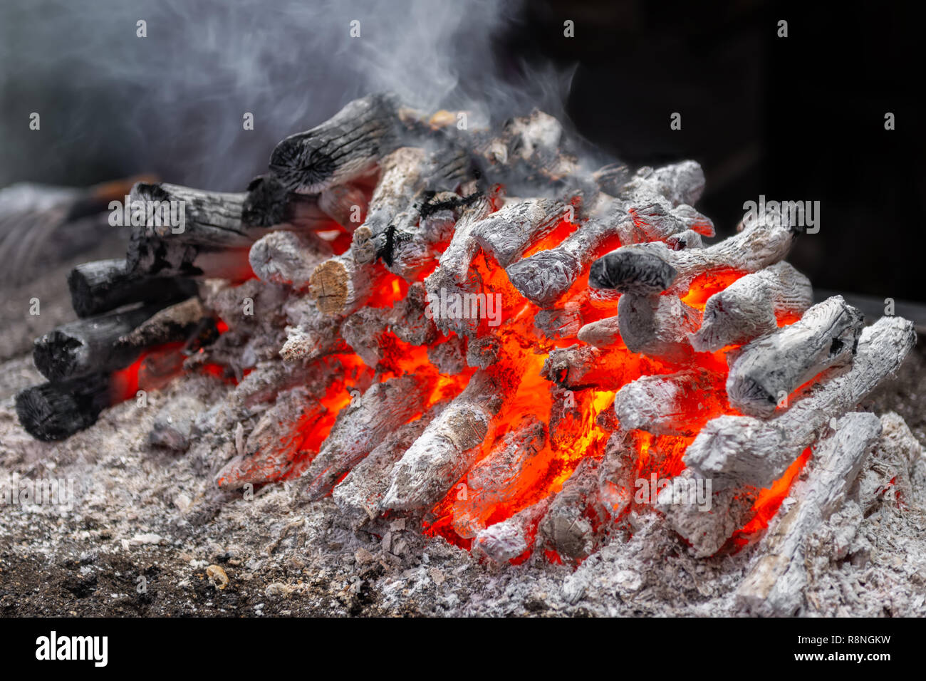 hot wooden embers with smoke for barbecue Stock Photo - Alamy