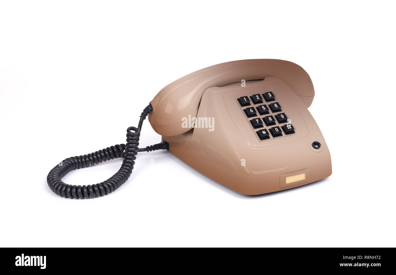 Vintage brown telephone with a white background Stock Photo - Alamy
