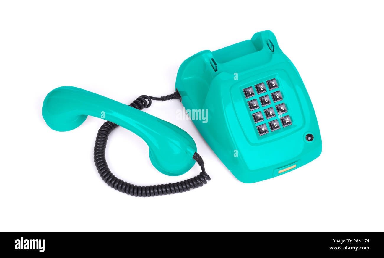 Vintage blue telephone with a white background Stock Photo - Alamy