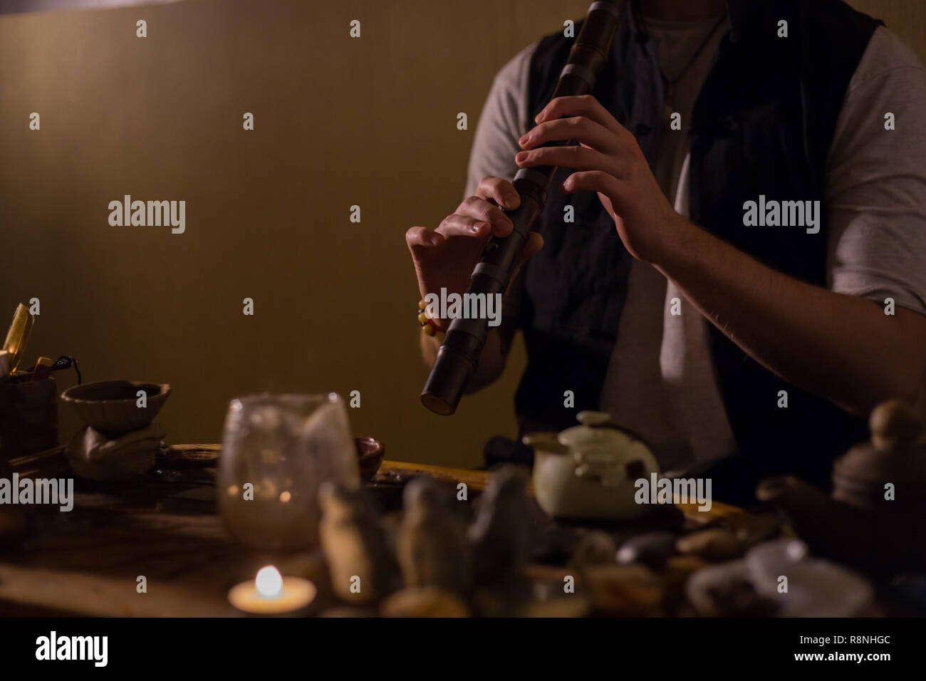 Man playing japanese bamboo flute - shakuhachi Stock Photo - Alamy