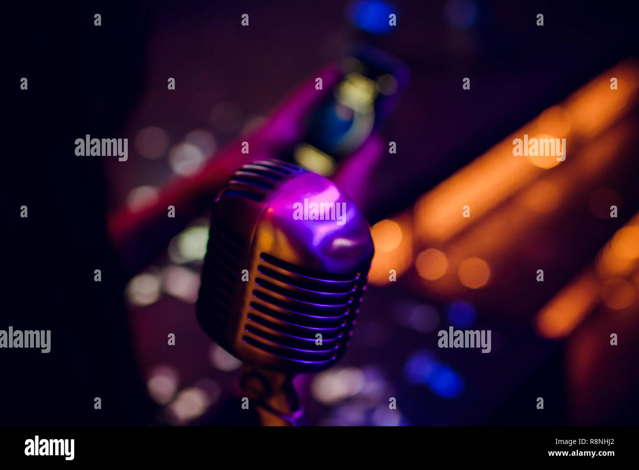 microphone on stand up comedy stage with reflectors ray, high contrast ...