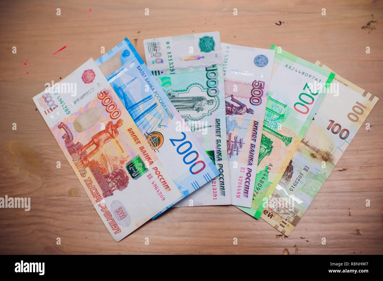 Russian roubles and some new 200 and 2000 roubles bills Stock Photo - Alamy
