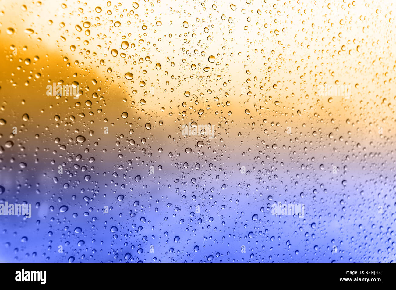 Waterdrops on a glass surface windows hi-res stock photography and ...