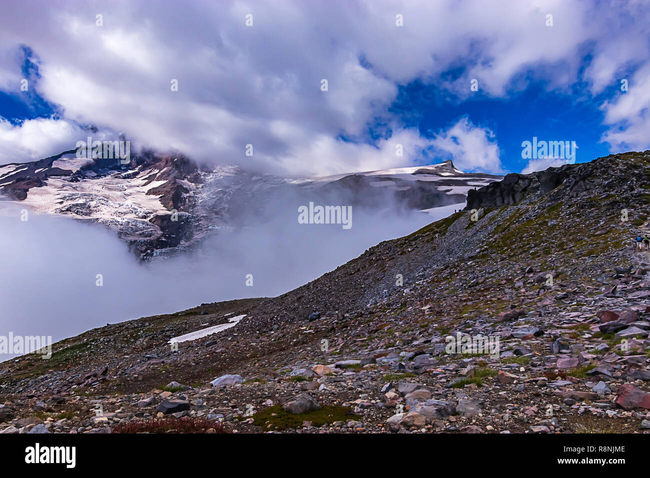 mountain layers with rock field below near mount rainier Stock Photo ...