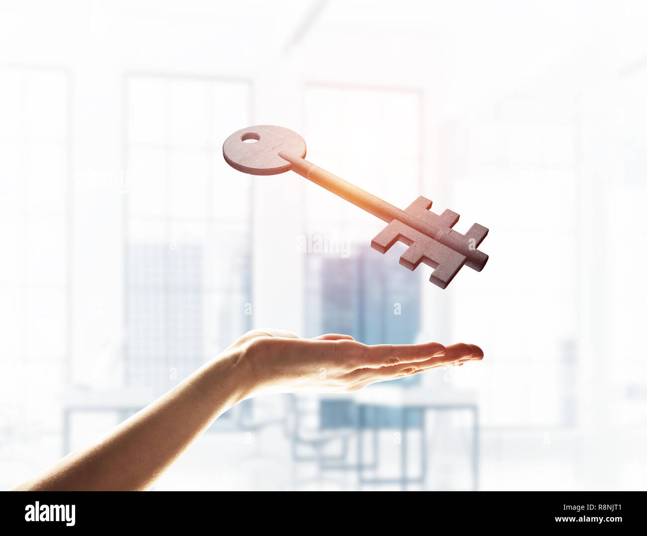 Key to new opportunities and success concept by symbol on hand. Mixed ...