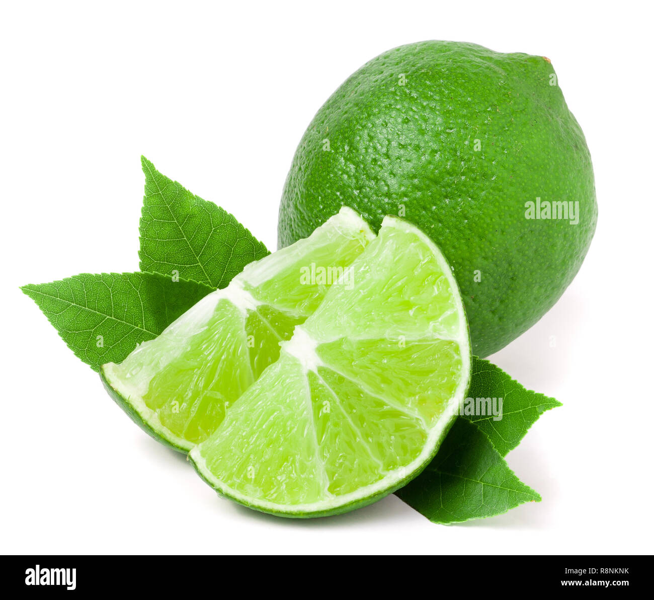 lime with slices and leaf isolated on white background Stock Photo - Alamy