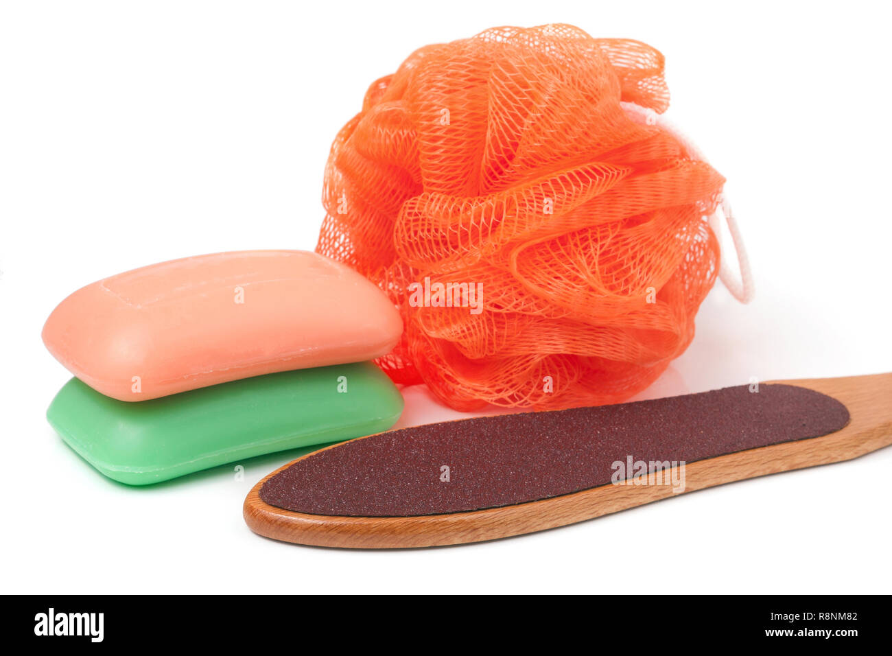 sponge shower with grater for feet and soap isolated on white ...