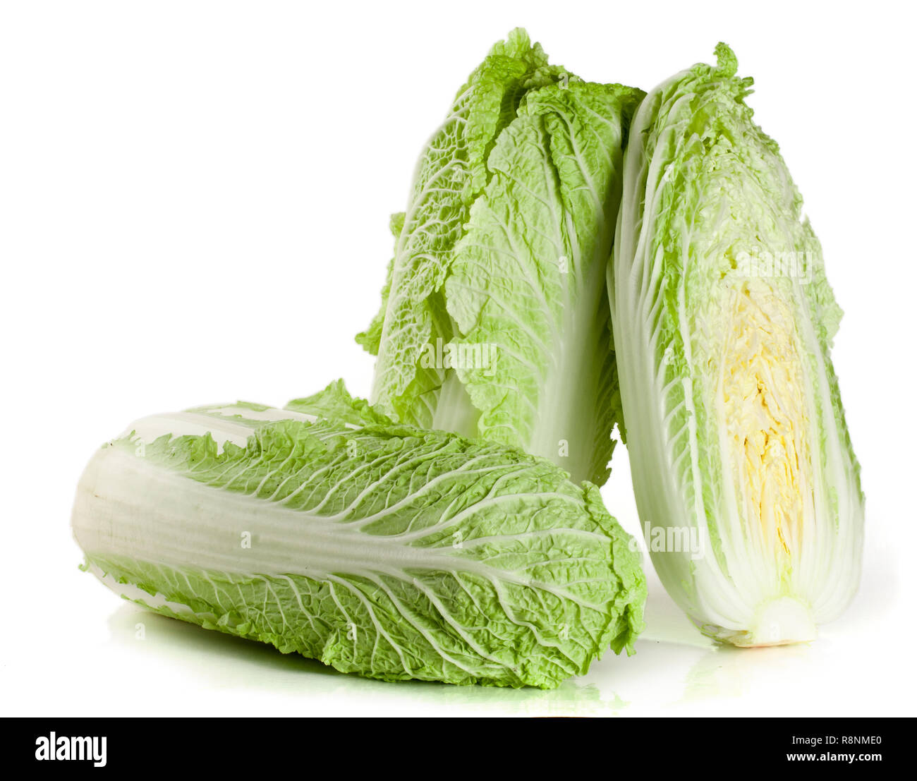 two chinese cabbage and half isolated on white background Stock Photo ...