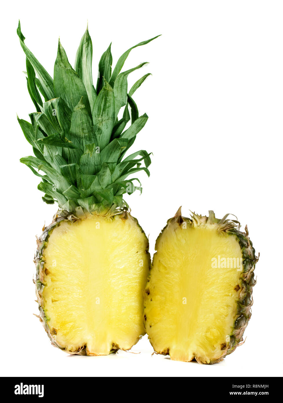 pineapple cut into two halves isolated on a white background Stock ...