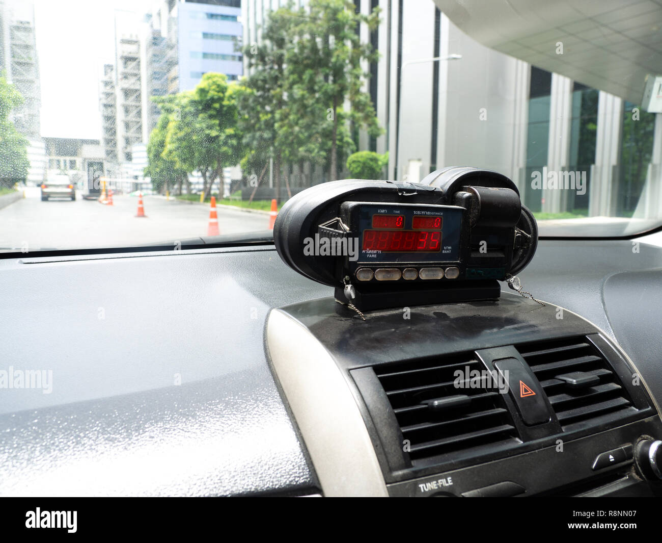 View from cab with meter display Time, Distance and Fare in dashboard ...