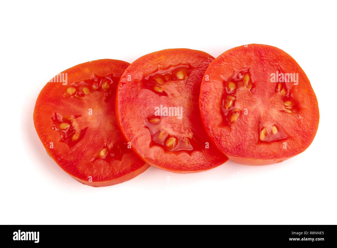 Three tomato slice isolated on white background. Top view Stock Photo ...