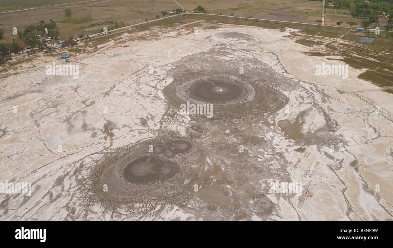 Mud volcano bledug kuwu. aerial view volcanic plateau with geothermal ...