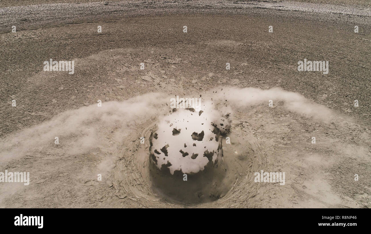 Mud volcano with bursting bubble bledug kuwu. aerial view volcanic ...