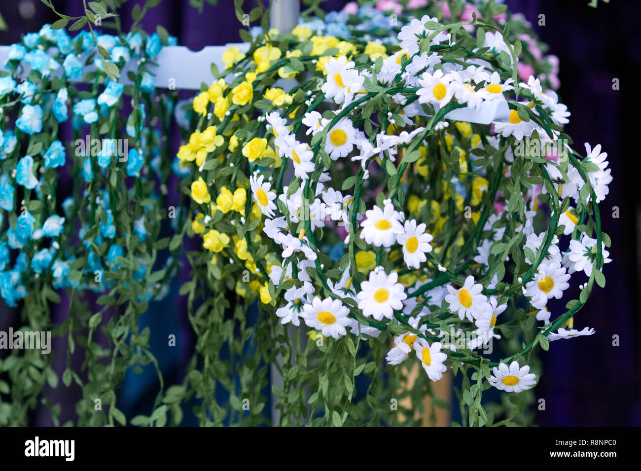 artificial floral head garlands Stock Photo - Alamy