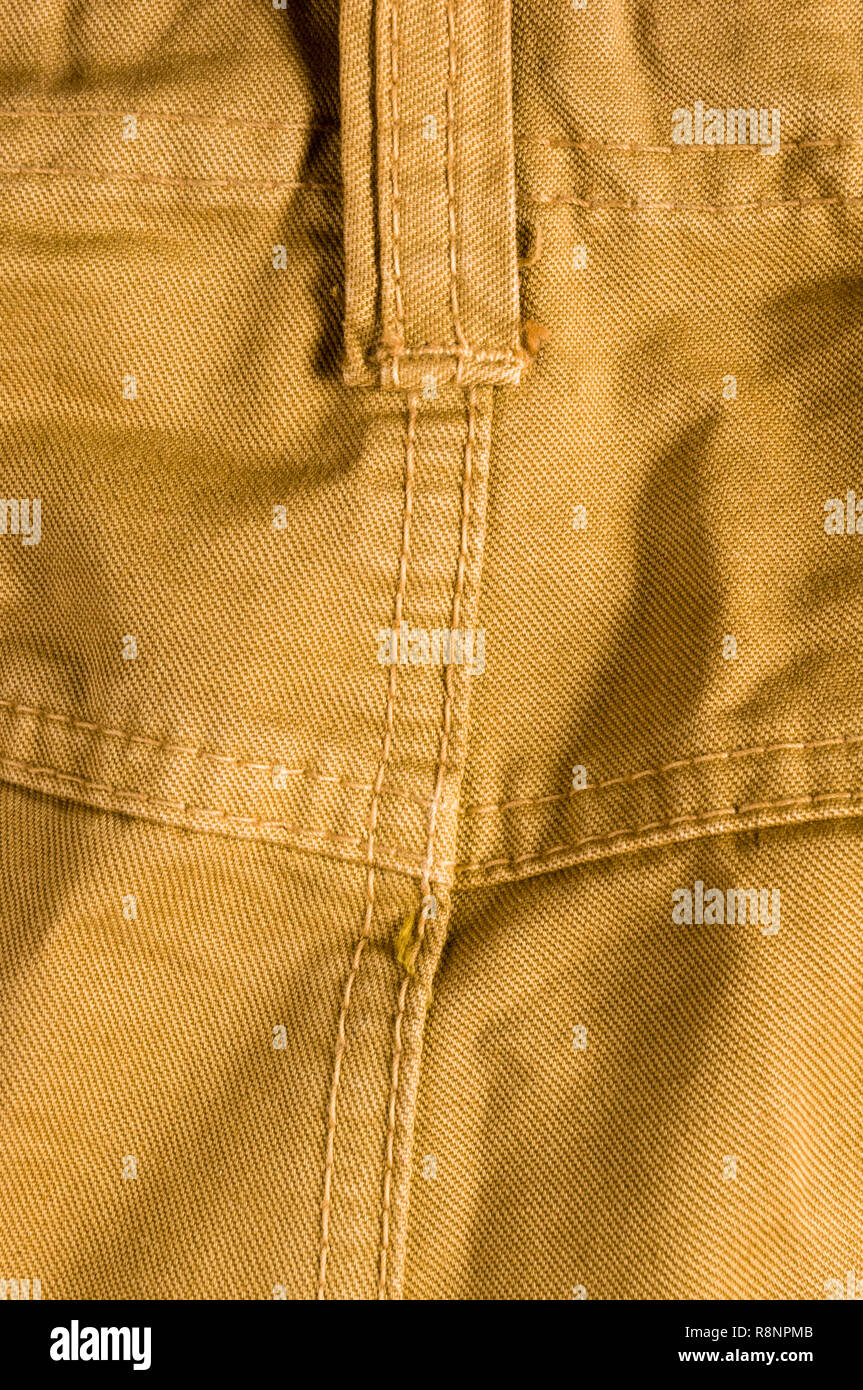 clothing items washed cotton fabric texture with seams, macro, close-up ...