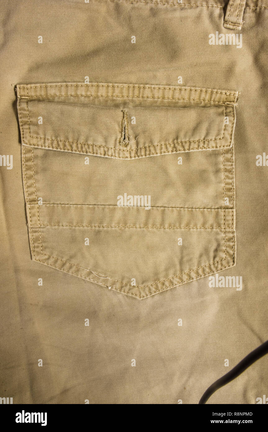 clothing items washed cotton fabric texture with seams, macro, close-up ...