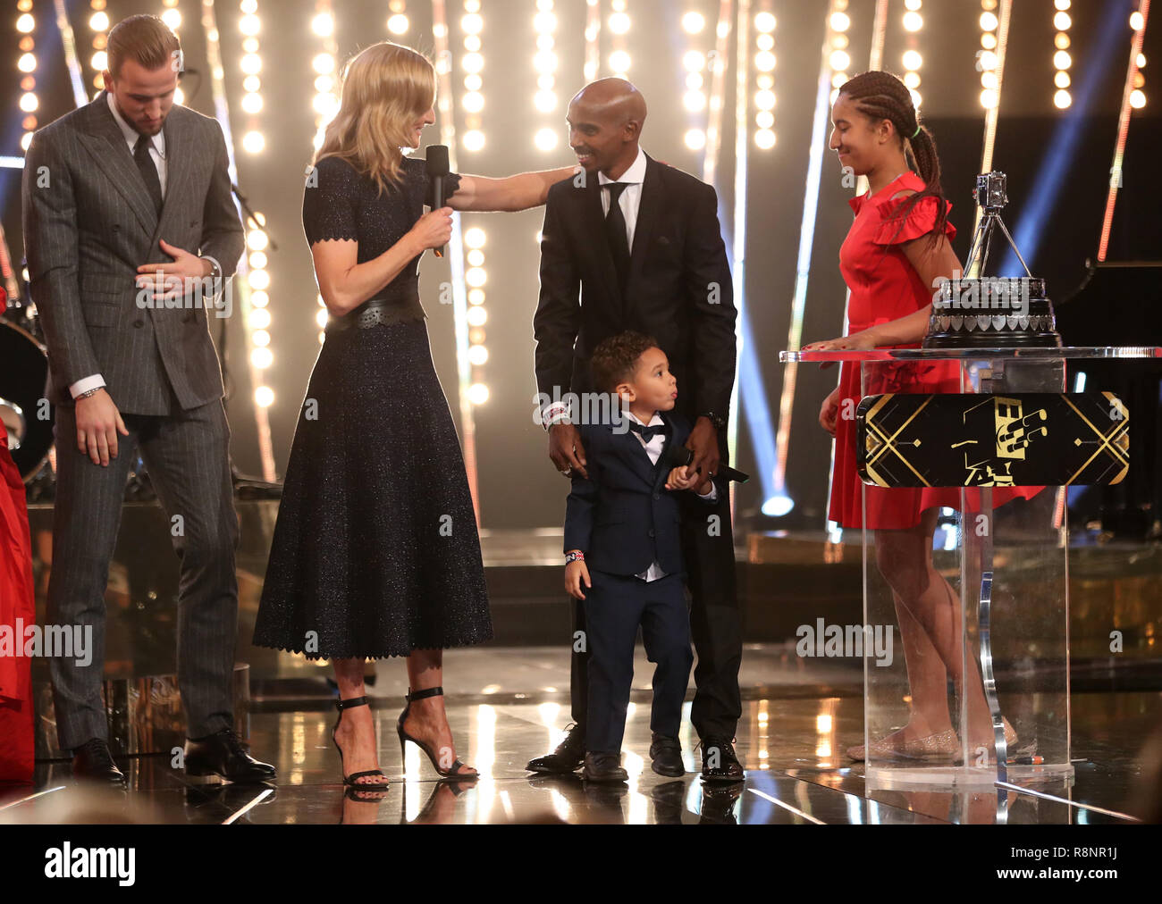 Sir Mo Farah is interviewed on stage (centre) by Hazel Irvine alongside ...