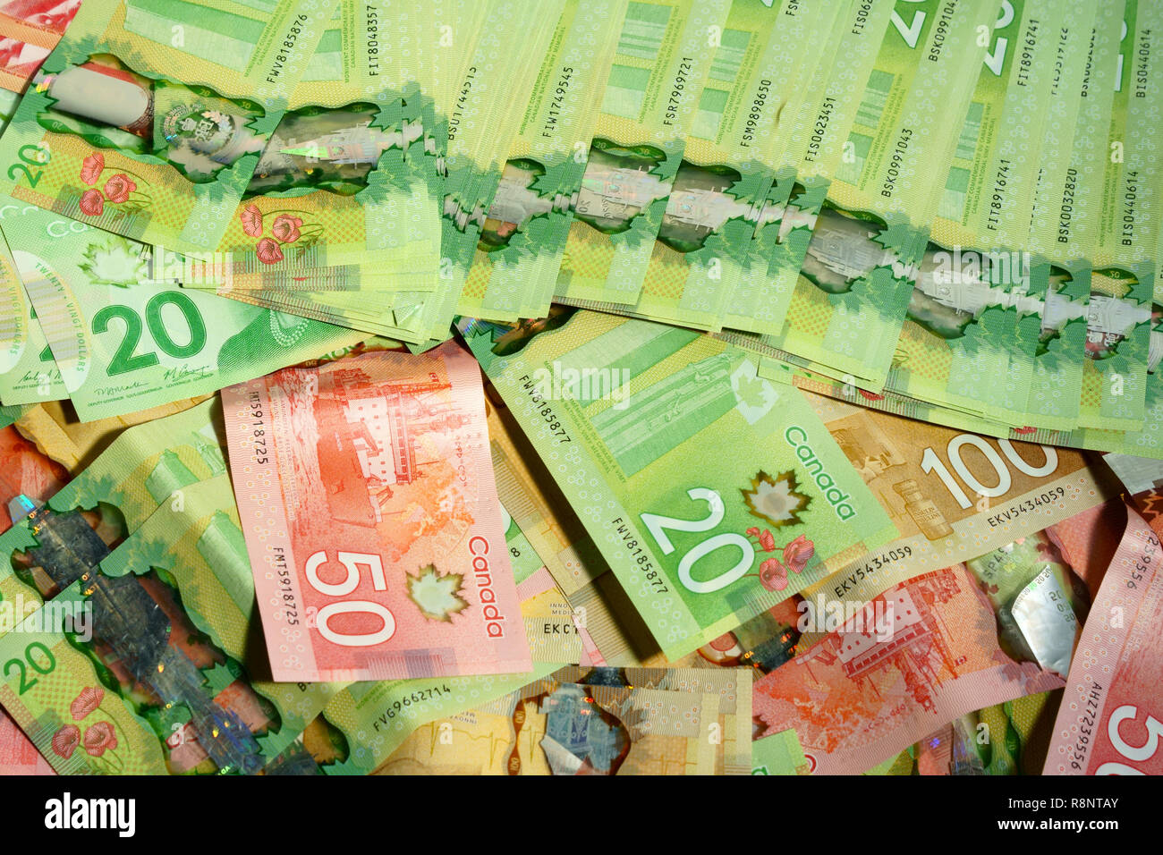 Canadian money and change Stock Photo - Alamy