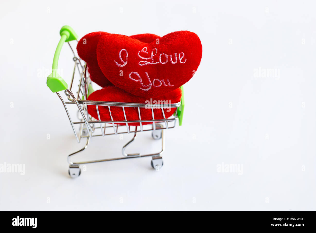 "I LOVE YOU" Red hearts in shopping cart on white background. Copy ...
