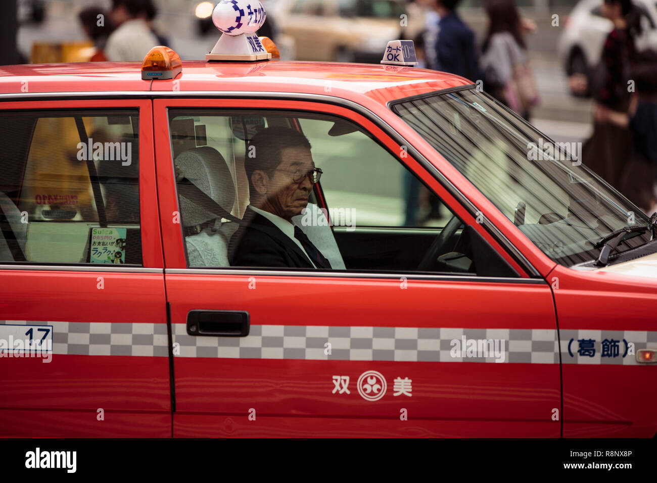 An intense looking taxi driver in Tokyo, Japan Stock Photo - Alamy