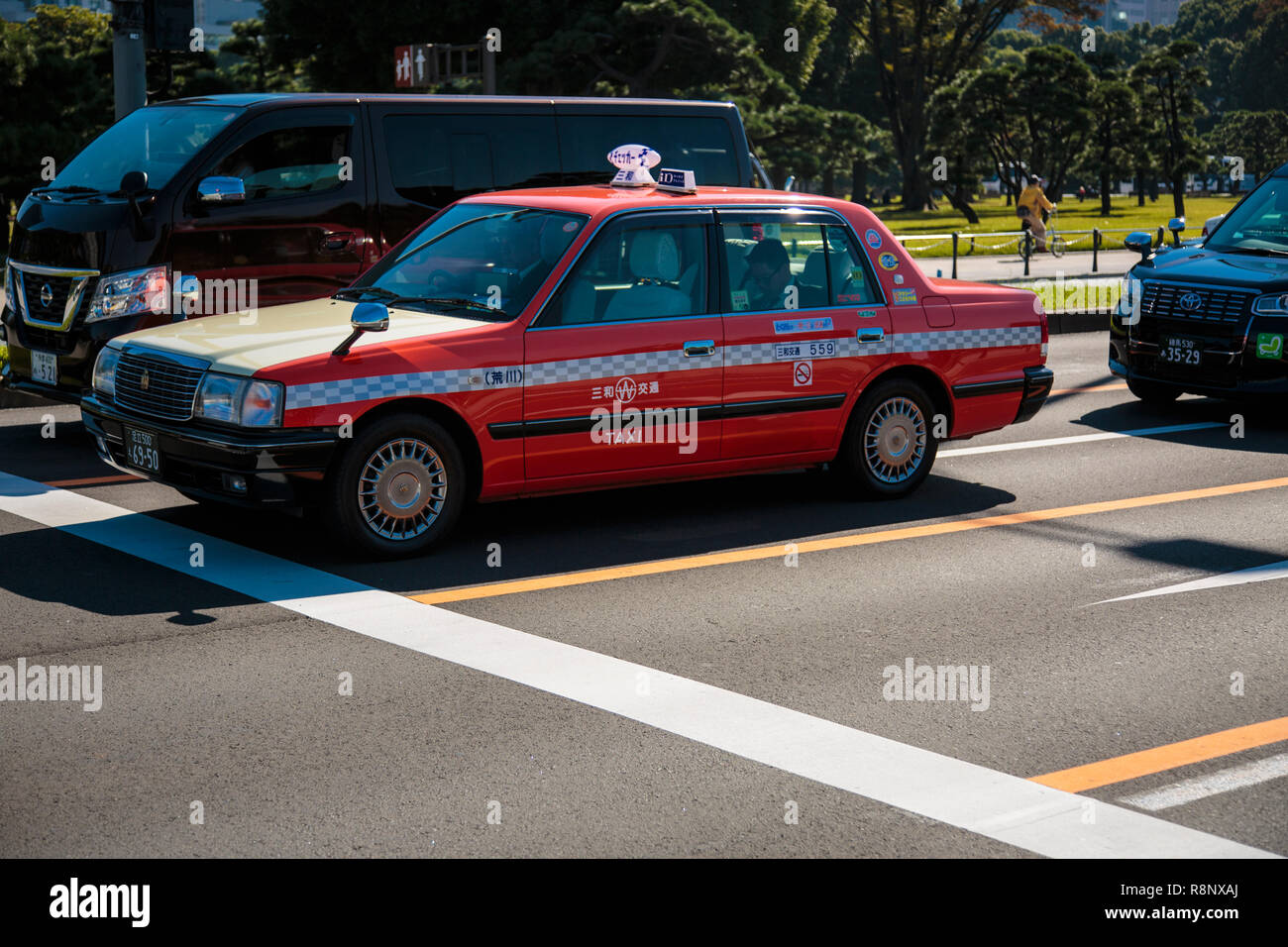 A brightly colored Japanese taxi cab in Tokyo Stock Photo - Alamy