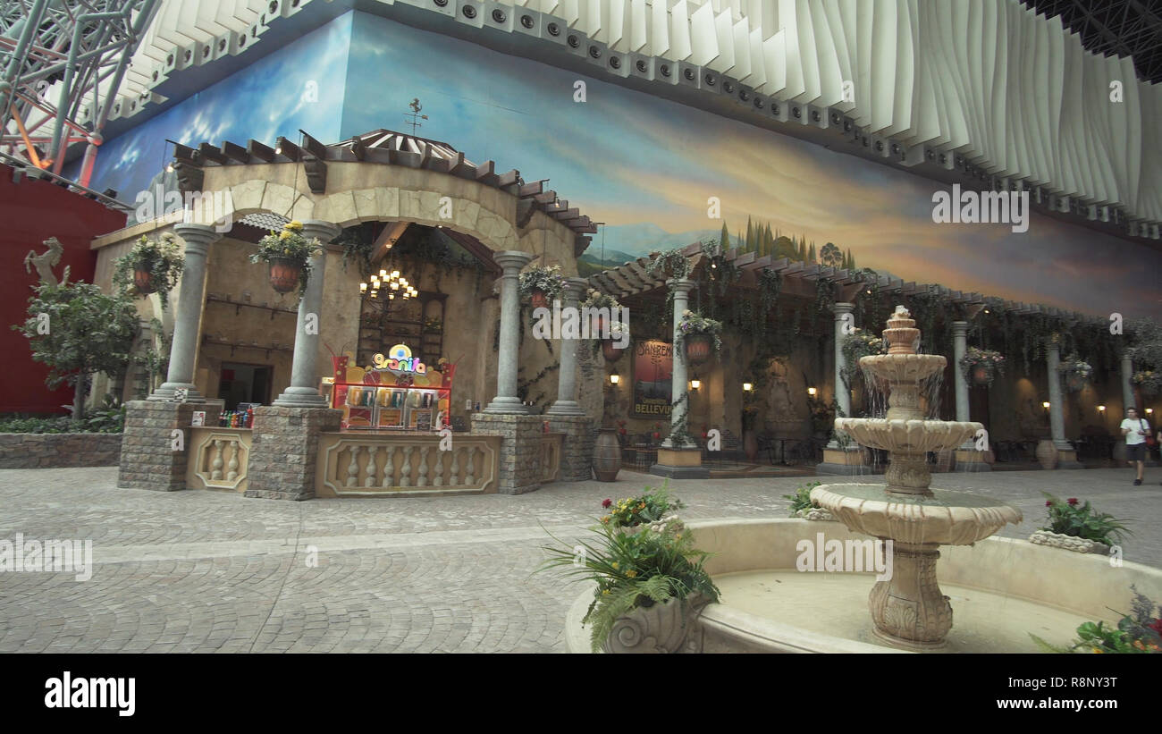 Italian street of cafes and shops in the theme park Ferrari World Abu ...