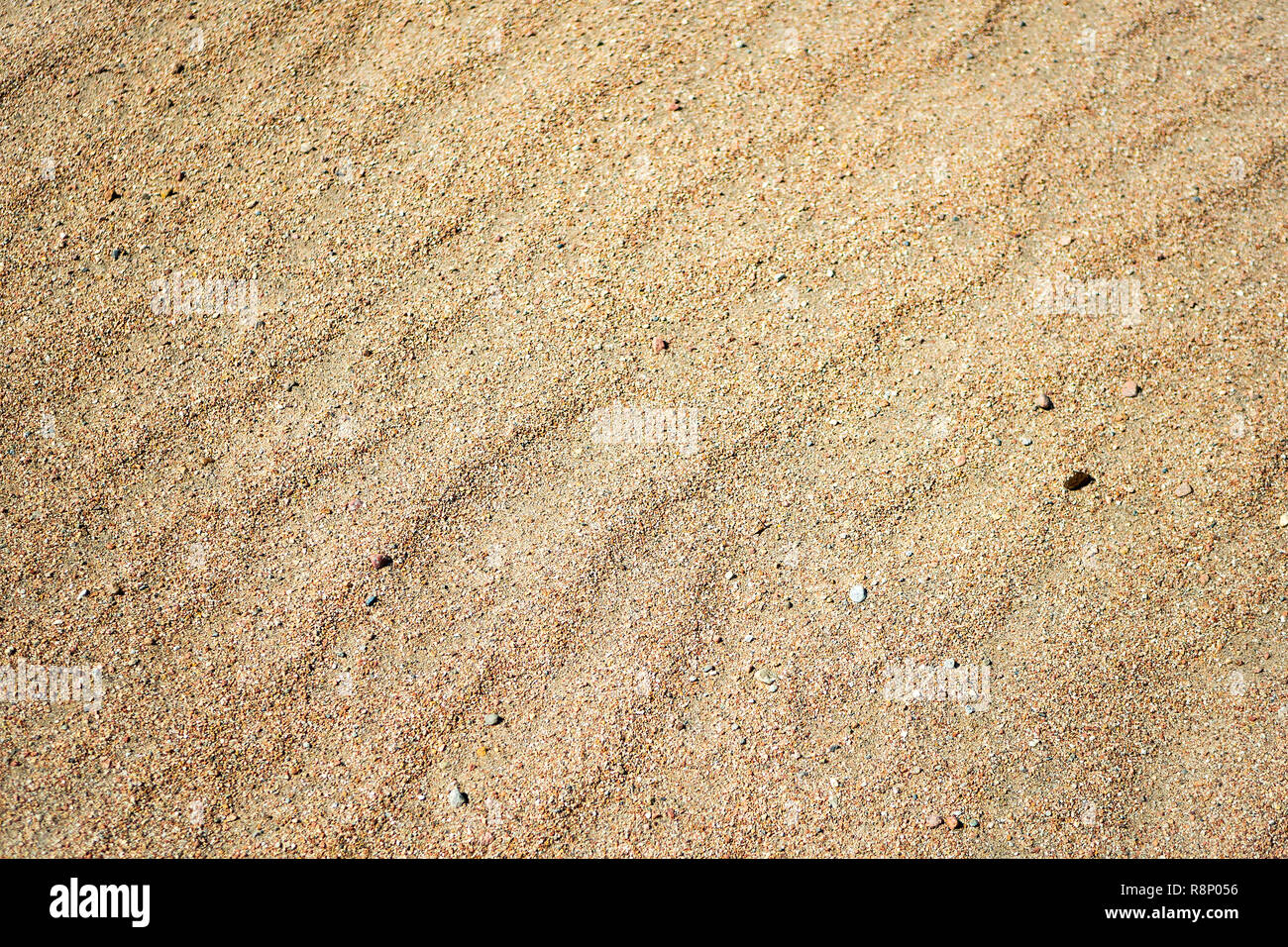 Sand on the beach at sunny day. Texture, background Stock Photo - Alamy