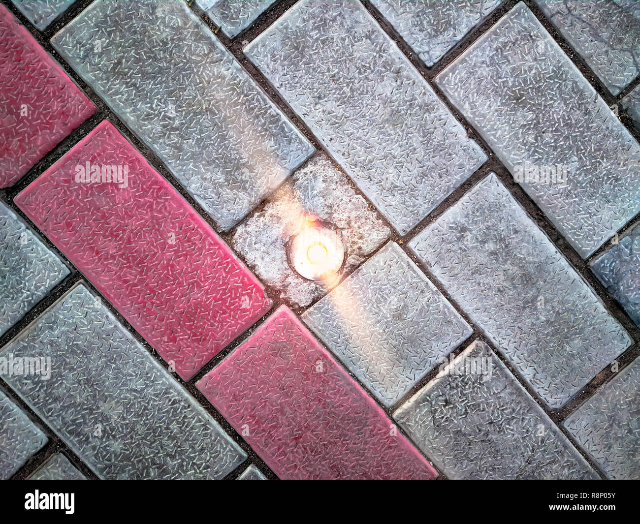 Outdoor Lighting. Garden lighting installed in stone pavement. Stone ...