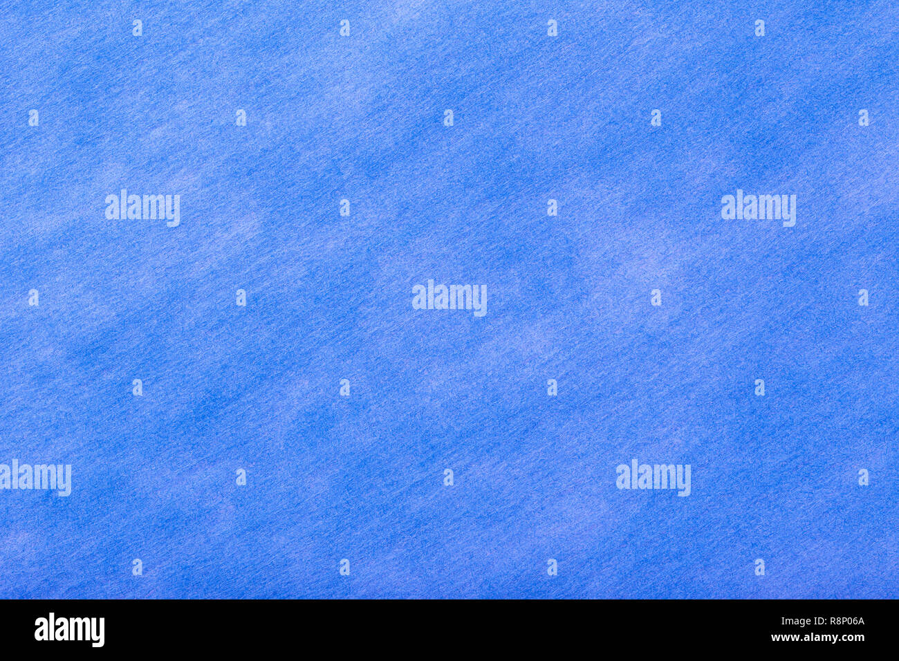 Structure of a navy blue background with white spots of felt fabric ...