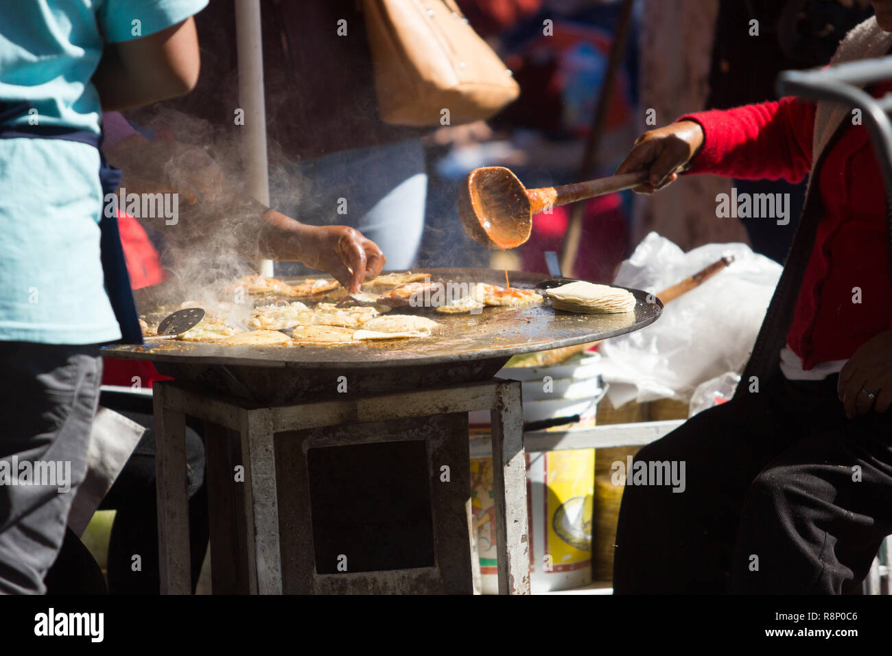 mexican street vendor cooking fry tacos with meat and sauce Stock Photo ...