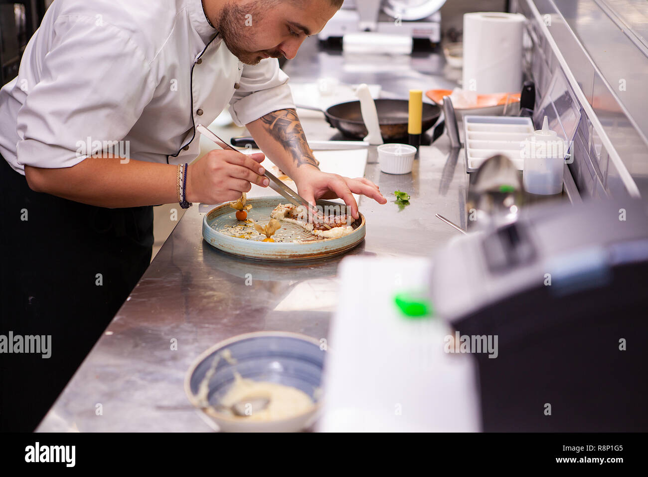 Chef fine dine design in kitchen restaurant. Secret incredient Stock ...