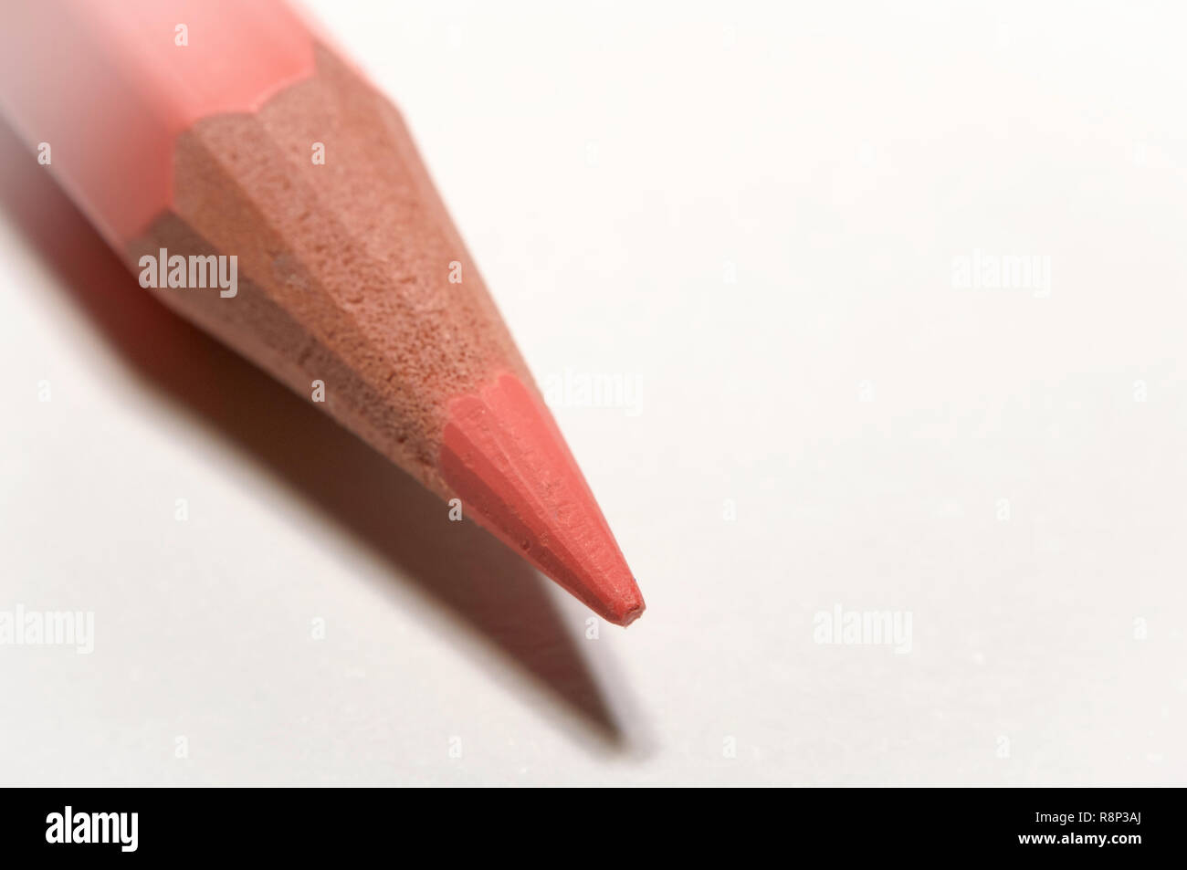 Macro of a pink color pencil, isolated on white paper Stock Photo - Alamy