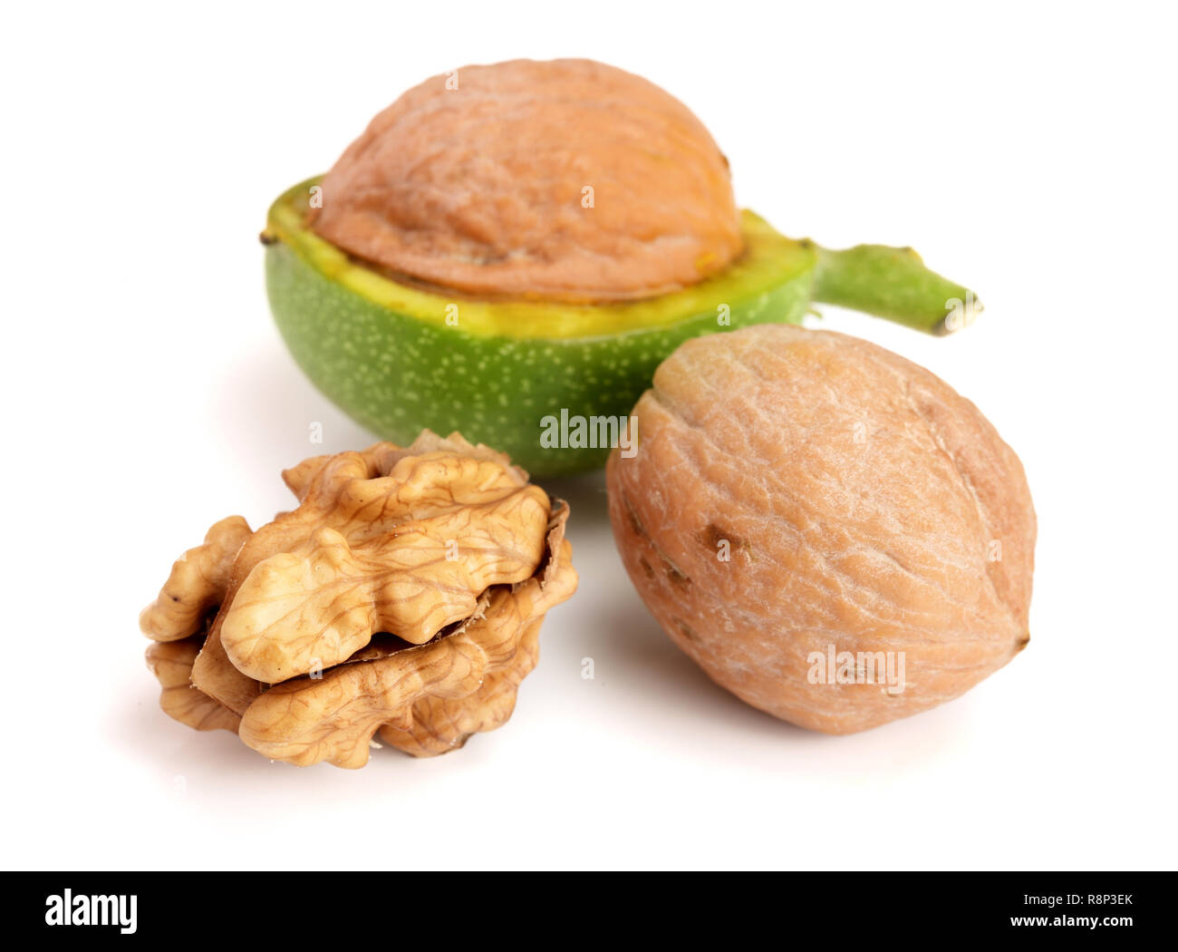 fresh walnuts in peel isolated on white background Stock Photo - Alamy