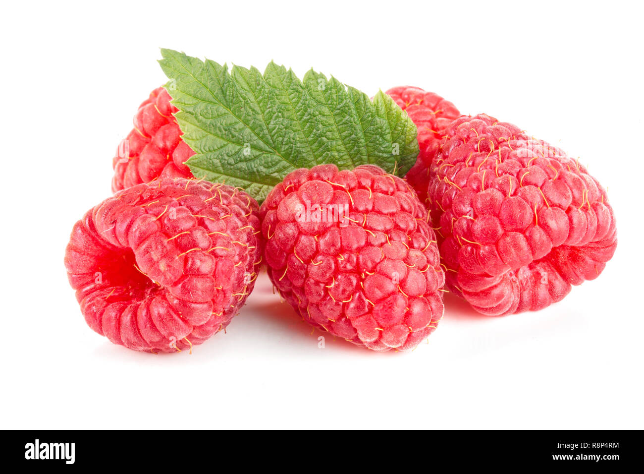 Raspberry isolated on white background. Pile or heap Stock Photo - Alamy