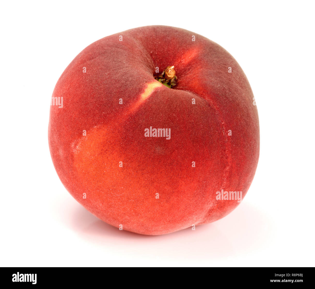 one red peach isolated on white background Stock Photo - Alamy