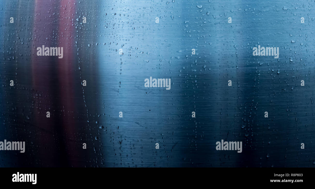 A reflection on a metallic surface in the rain Stock Photo - Alamy