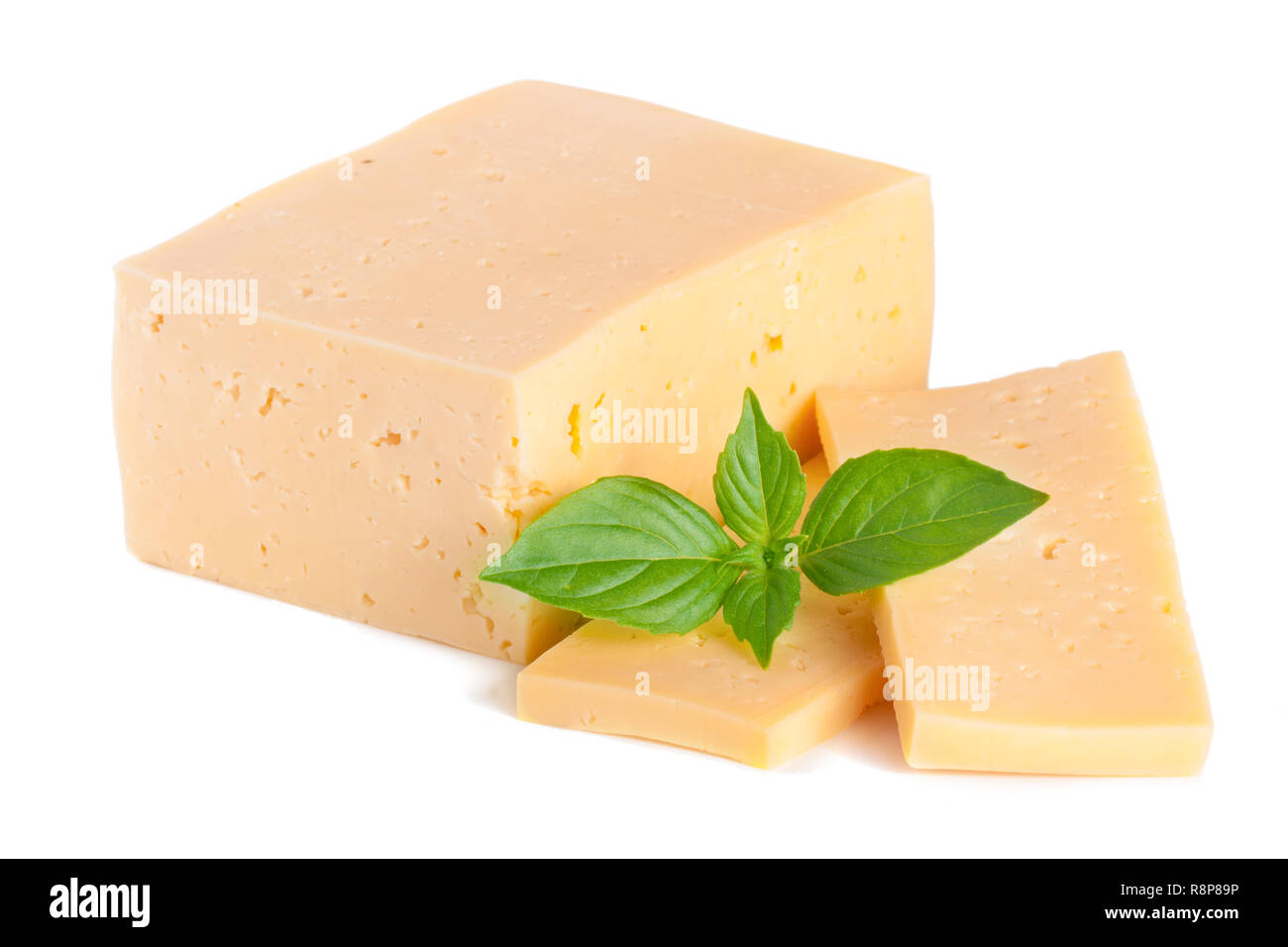 cheese with basil leaves isolated on white background Stock Photo - Alamy