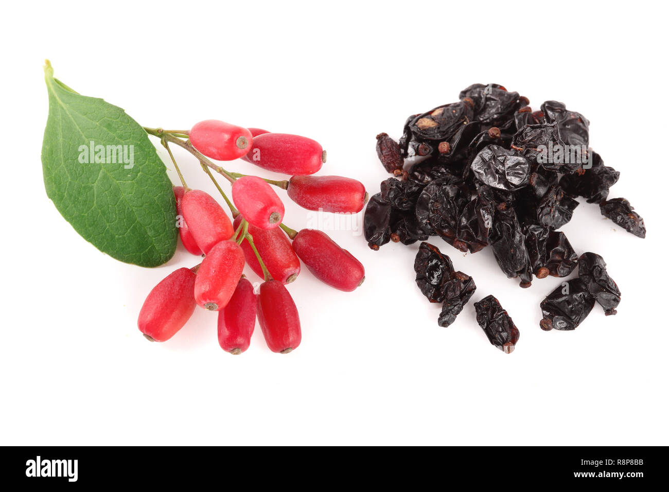 dried and fresh barberry with leaves isolated on white background. top ...