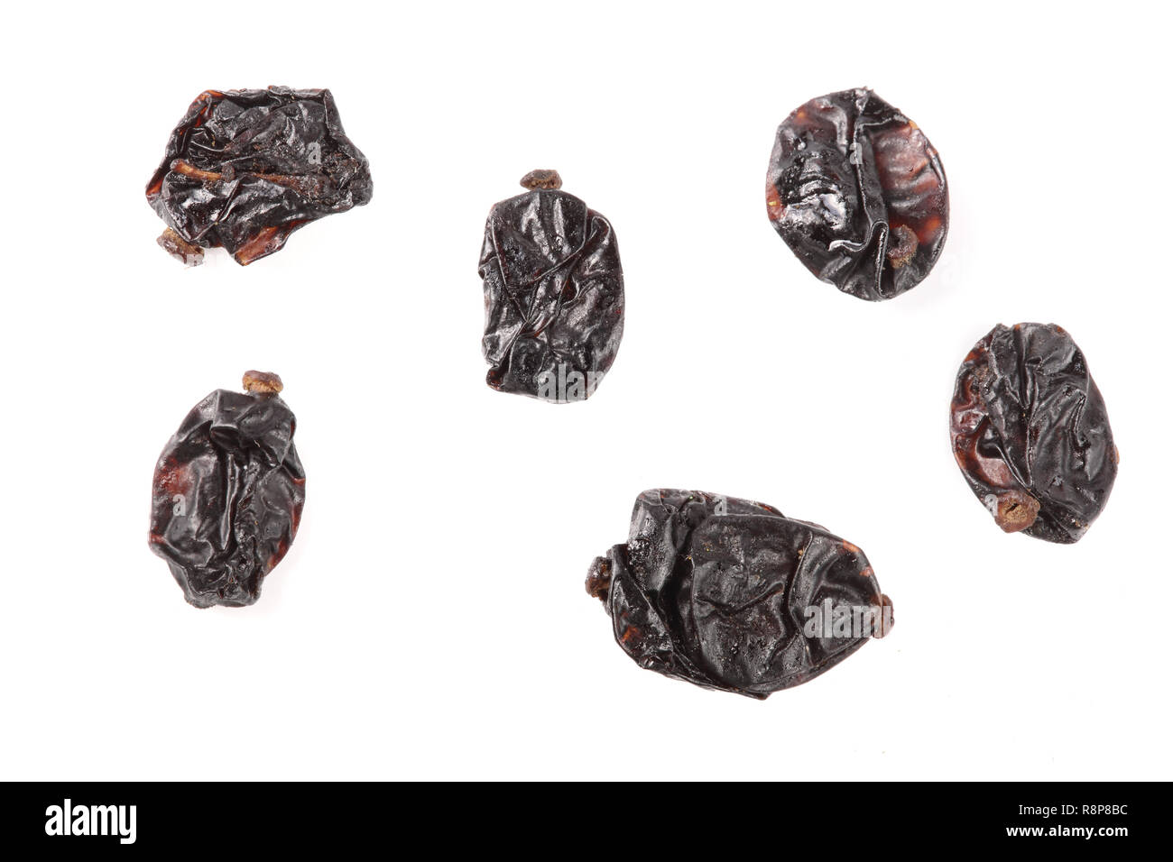 Barberry seeds isolated on white background top view Stock Photo - Alamy