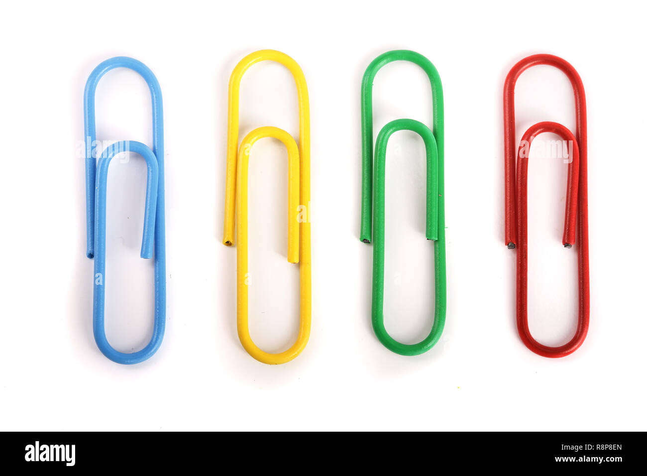 colored paper clips isolated on white background Stock Photo - Alamy