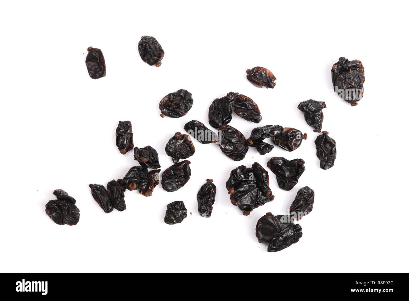 Barberry seeds isolated on white background top view Stock Photo - Alamy