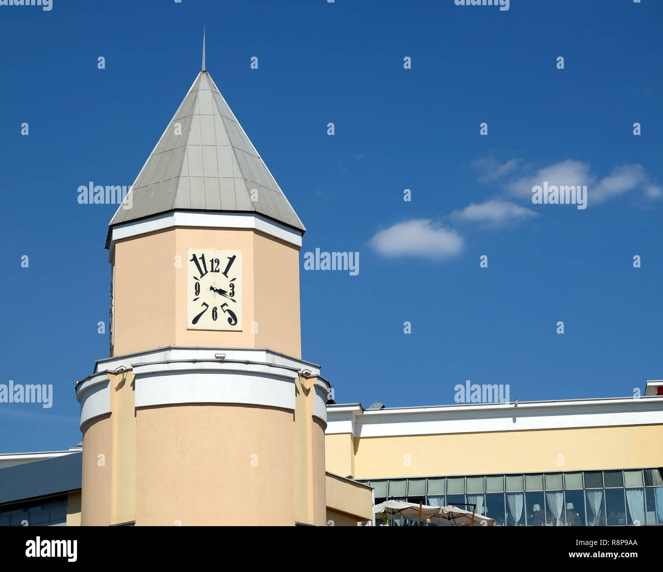 Modern style square clocks with black arabian digits shows quater pas ...