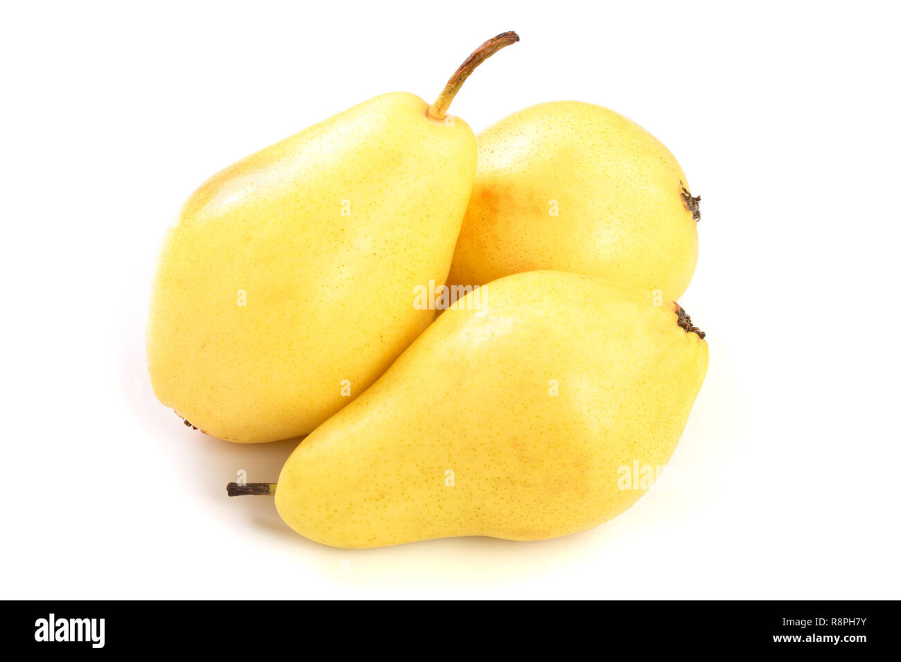 Three ripe yellow pear fruits isolated on white background Stock Photo ...