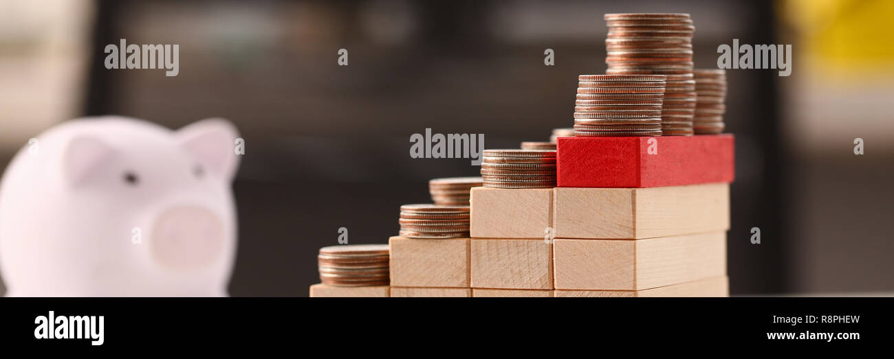 Hand businessman putting pin money Stock Photo - Alamy