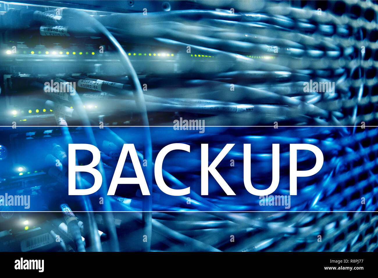 Backup button on modern server room background. Data loss prevention ...