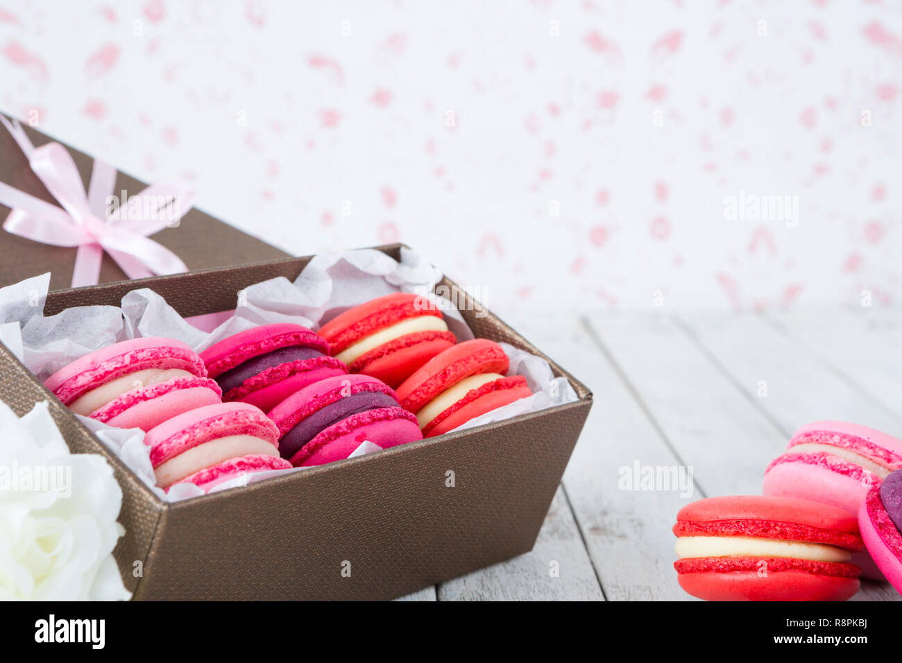 A collection of pink macarons in a gift box Stock Photo - Alamy