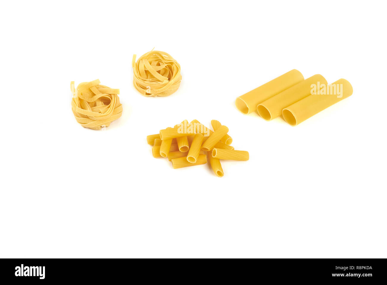 different pasta varieties isolated on white background Stock Photo - Alamy