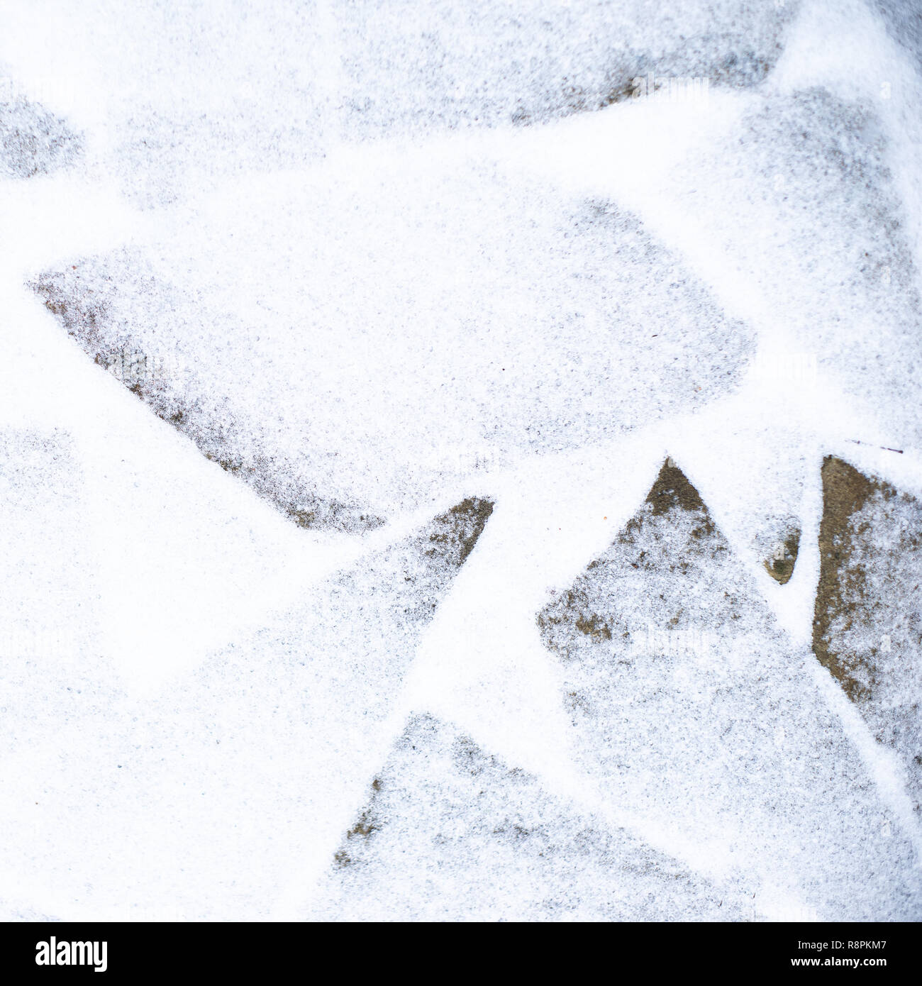 Winter pavement background. Snow covered wild stone paving tiles Stock ...