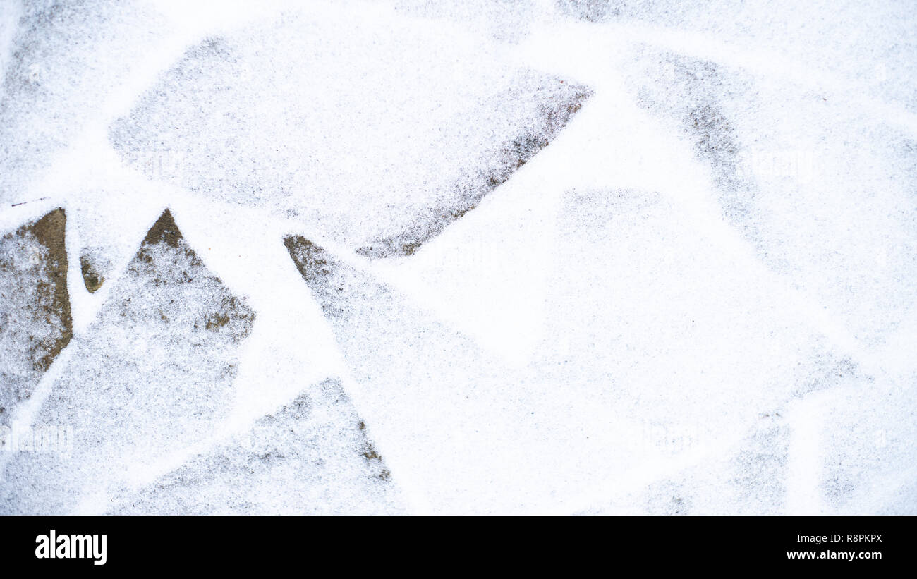 Winter pavement background. Snow covered wild stone paving tiles Stock ...